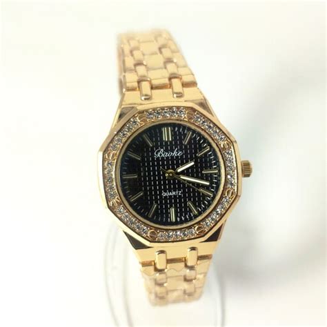 خرید و قیمت ساعت زنانه عقربه ای ساعت مچی زنانه دخترانه طلایی طرح سه