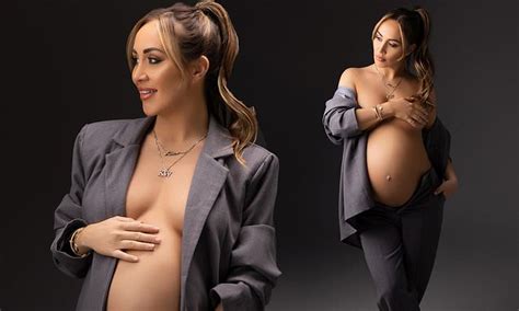 Pregnant Lauryn Goodman Displays Her Bare Bump In A Stylish Grey Suit During A Stunning