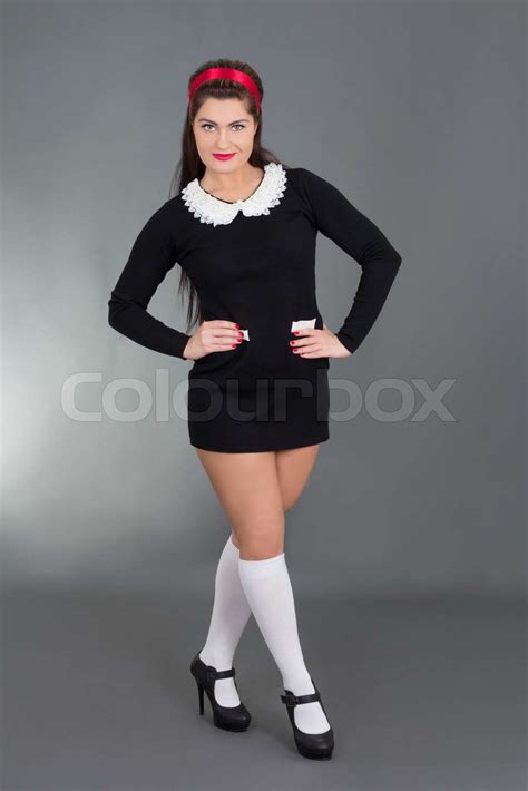 Sexet Pige I Sort Uniform Med Retro Frisure Stock Foto Colourbox
