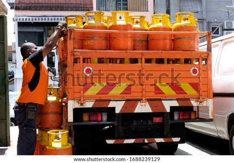 Man Unloading Canisters Cooking Gas Supply Stock Photo 1688239129 Shutterstock
