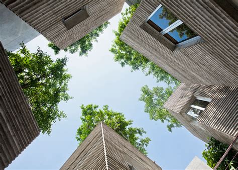 Trees Grow On Rooftops Of House By Vo Trong Nghia Architects