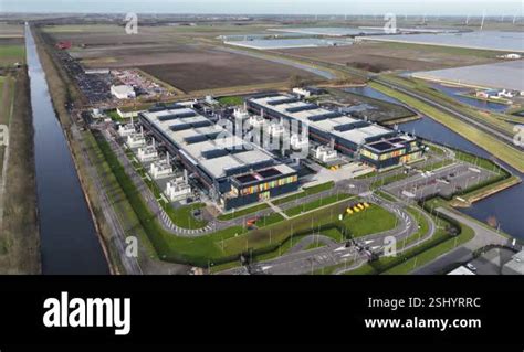 Aerial View Data Center In The Netherlands Showcasing Infrastructure For Ai Algorithms