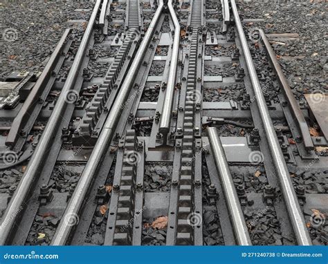 railroad tracks railroad switcher rails and crossing on rise in