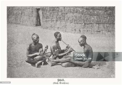 Acholi While Making Music Halftone Print Published In 1899 Stock