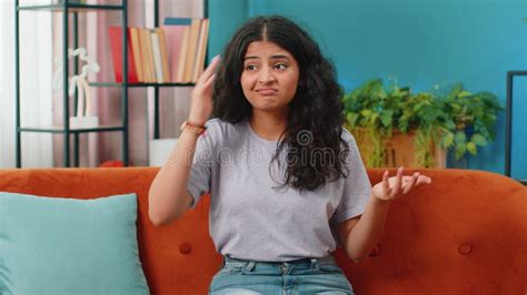 Confused Arabian Woman Feeling Embarrassed About Ambiguous Question