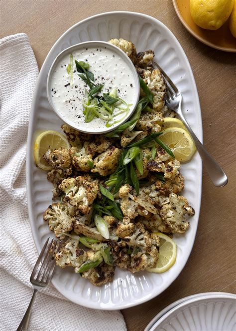 Lemon Pepper Cauliflower Wings with Garlic Feta Dipping Sauce - Laura ...