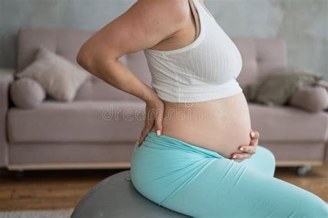 Caucasian Pregnant Woman Suffers From Belly Pain Fitball Training