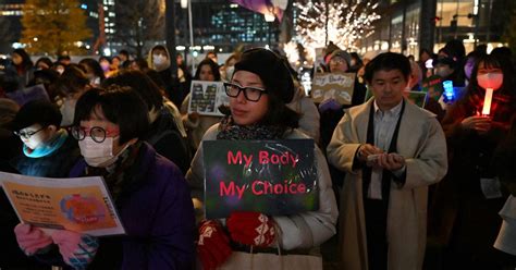 People Across Japan Gather To Protest Misogyny After Writers Uterus