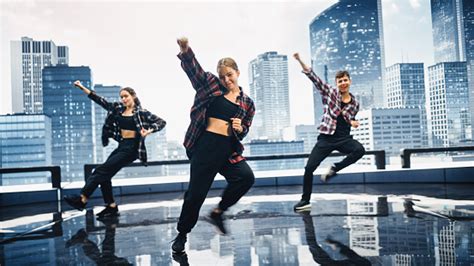 Diverse Group Of Three Professional Dancers Performing A Hip Hop Dance