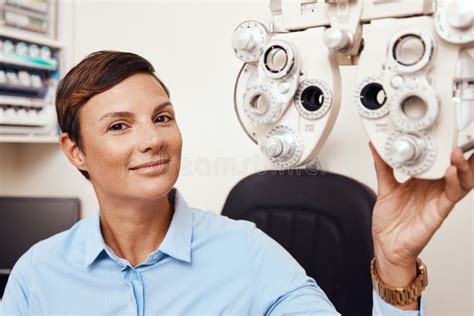Portrait Of Professional Optometrist Confident And Happy In An