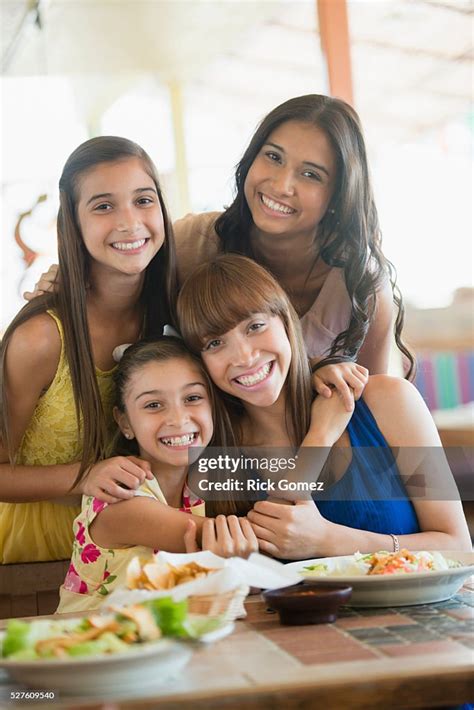 Portrait Of Mexican Sisters In Restaurant Wellington Palm Beach County