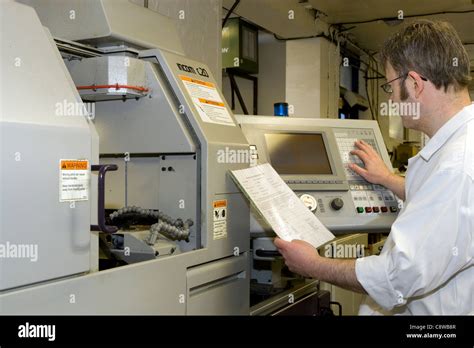 Cnc Lathe Operator Programming In Data Setting Up A Task Stock Photo Alamy