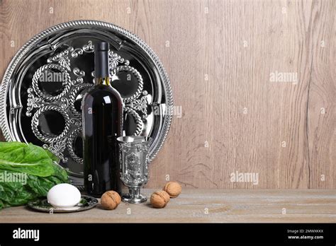 Symbolic Pesach Passover Seder Items On Wooden Table Space For Text