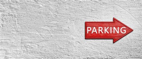 Red Wooden Shooter Sign With The Inscription Parking Hangs On A