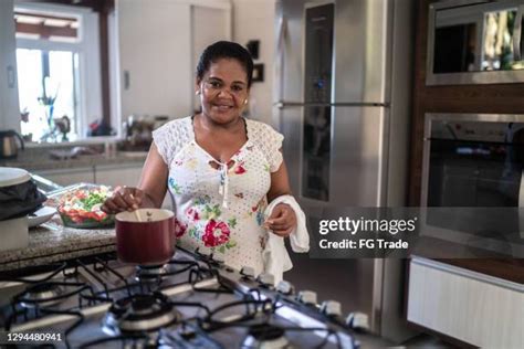 Mature Black Woman Cooking Photos And Premium High Res Pictures Getty