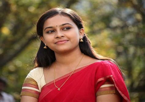 Sri Divya In Varutha Padatha Valibar Sangam In Blue Saree