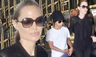 Slender Angelina Jolie And Her Trendy Babe Maddox Turn Heads As They Sweep Into LA Together