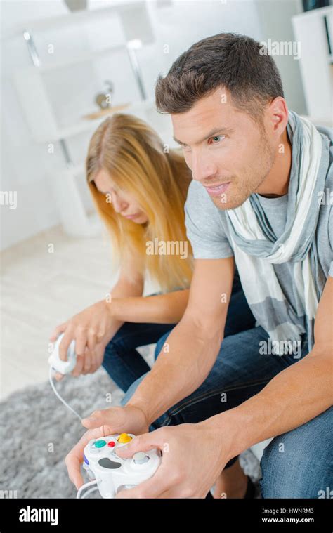 Couple At Home Playing Computer Game Stock Photo Alamy