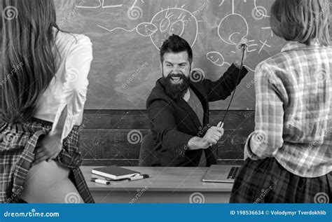Sexology Teacher Looks At Two Female Students Erotic Education Education And Sex Symbols On
