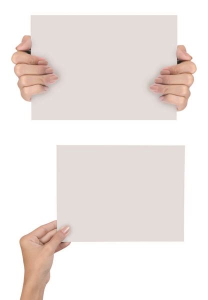 دو تصویر با دست کاغذ خالی جدا شده در پس زمینه سفید 1298897