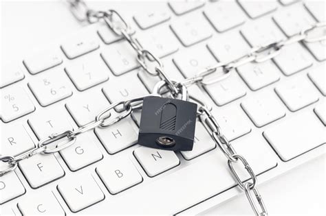 Premium Photo Computer Security Concept Chain And Padlock On Keyboard