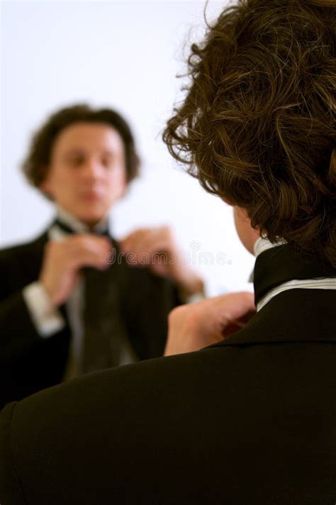 Man Adjusting Tie In The Mirror Stock Image Image Of Back Wear 4741893