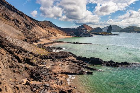 Premium Photo Pinnacle Rock And The Volcanic Landscape Bartolome