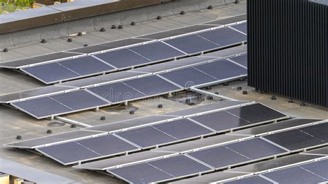 A Solar Panel Array Is Installed On A Roof Stock Image Image Of Clean