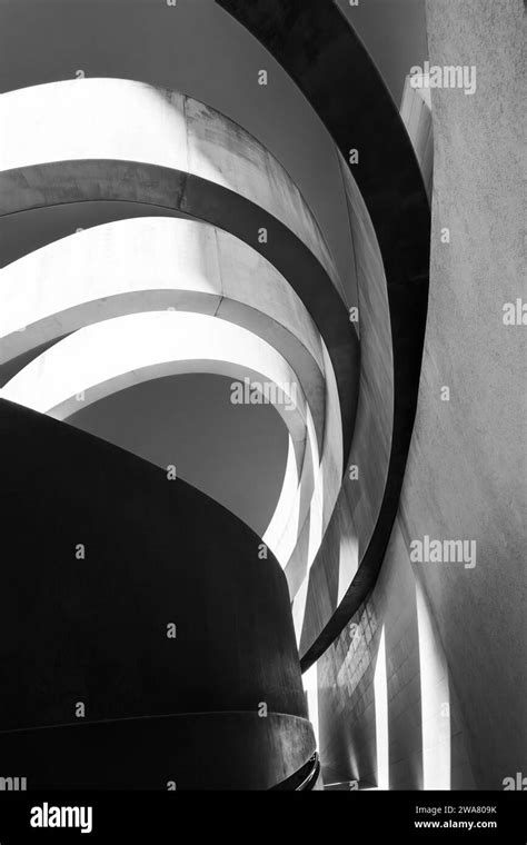 Striking Monochrome Architectural Feature With Sweeping Curves And A Dynamic Interplay Of Light