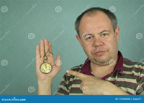 The Man Is Pointing At The Clock Stock Photo Image Of Casual Hurry