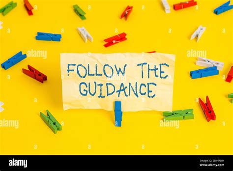 Writing Note Showing Follow The Guidance Business Concept For