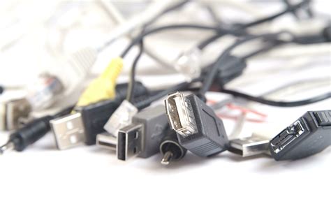 A Hand Holding Several Different Types Of Cables 27094469 Stock Photo At Vecteezy