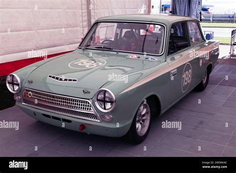 Three Quarters Front View Of Pattle And Burton S Mk Green Ford Lotus Cortina On