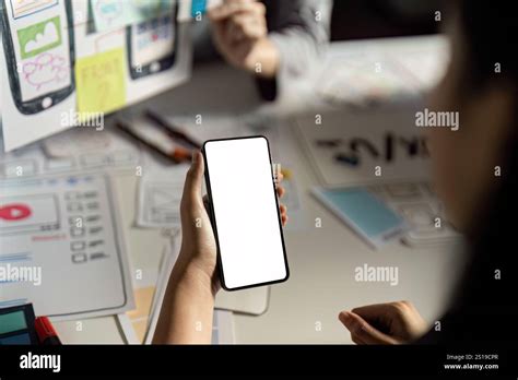 Creative Ux Ui Design Process With Mobile App Prototypes And Wireframes In Modern Office Setting