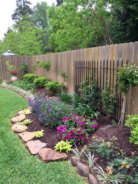 This Is A Nice Way To Use Black Fencing From An Old House Against A