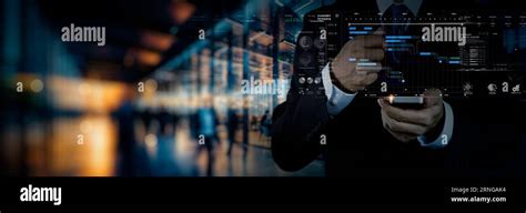 Project Management Team Updating Planning Schedule With Gantt Chart On Smartphone At The Office