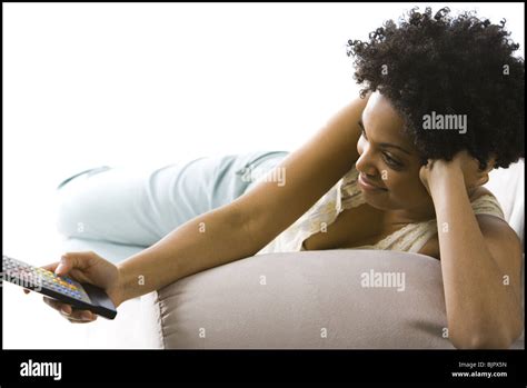 Woman With A Remote Control Stock Photo Alamy