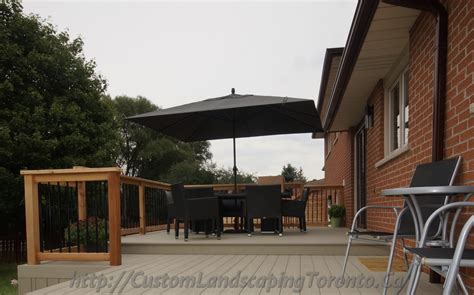 Interlock Pathway With Pvc Deck Toronto Landscaping Design And Interlock Driveway Paving Company