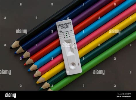 negative rapid sars cov 2 antigen test on colourfull pencils in school