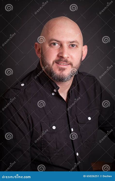 Studio Portrait Of Smiling Bold Man With Beard Stock Image Image Of