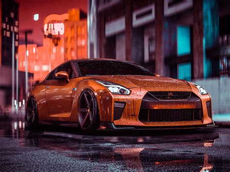 Download Orange Sports Car Rainy Night Wallpaper