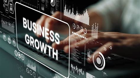 Hands Typing On Keyboard With Business Growth Graphics And Data Visualizations Concept