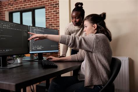 free photo caucasian network developer pointing out high usage of