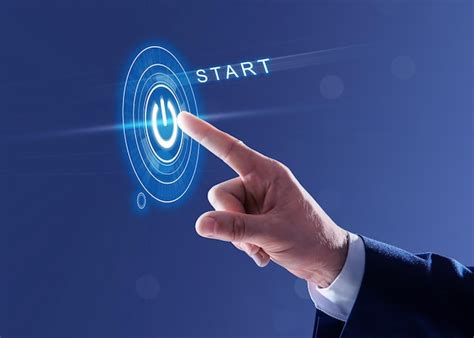 Premium Photo Man Pressing Start Button On Virtual Screen Against Blue Background Closeup