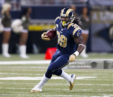 Running Back Steven Jackson Of The St Louis Rams Runs Up The Field