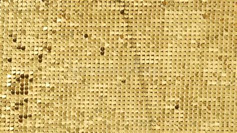 Rows Of Blinking Golden Yellow Brass Metal Plaques Sway In Wind And