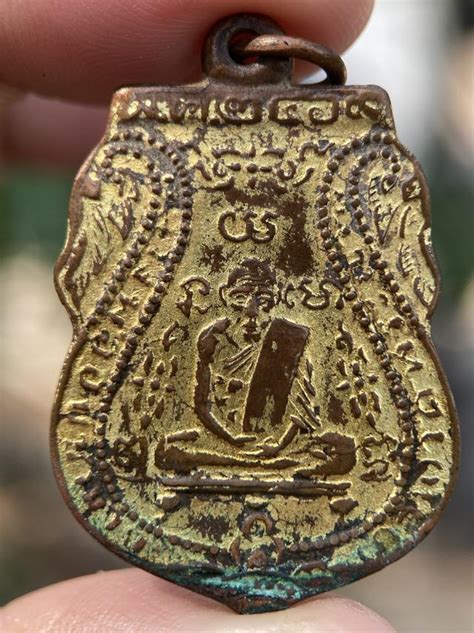 เหรียญหลวงพ่อกลั่น วัดพระญาติ 2469 Ennxo