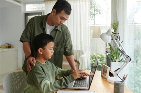 Father Helping Preteen Son With Programming Stock Image Image Of Think Solution