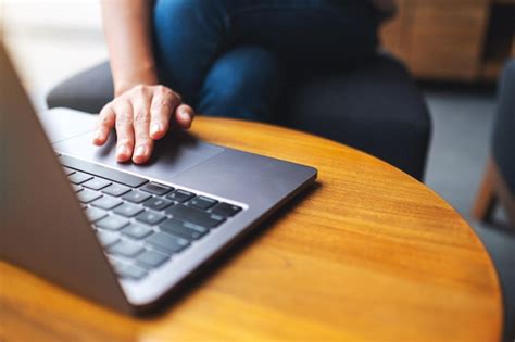 Premium Photo Closeup Image Of A Woman Working And Touching On Laptop Computer Touchpad On The