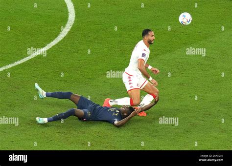 France S Randal Kolo Muani Left And Tunisia S Nader Ghandri Battle